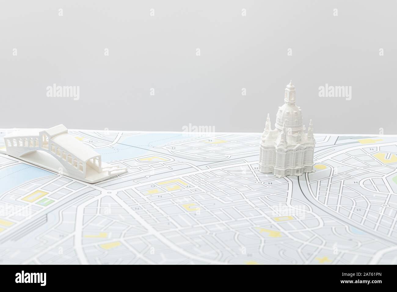 small figurines on map of italy isolated on grey Stock Photo - Alamy