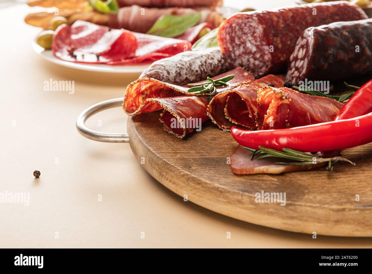 delicious meat platters served with olives, spices and breadsticks on ...