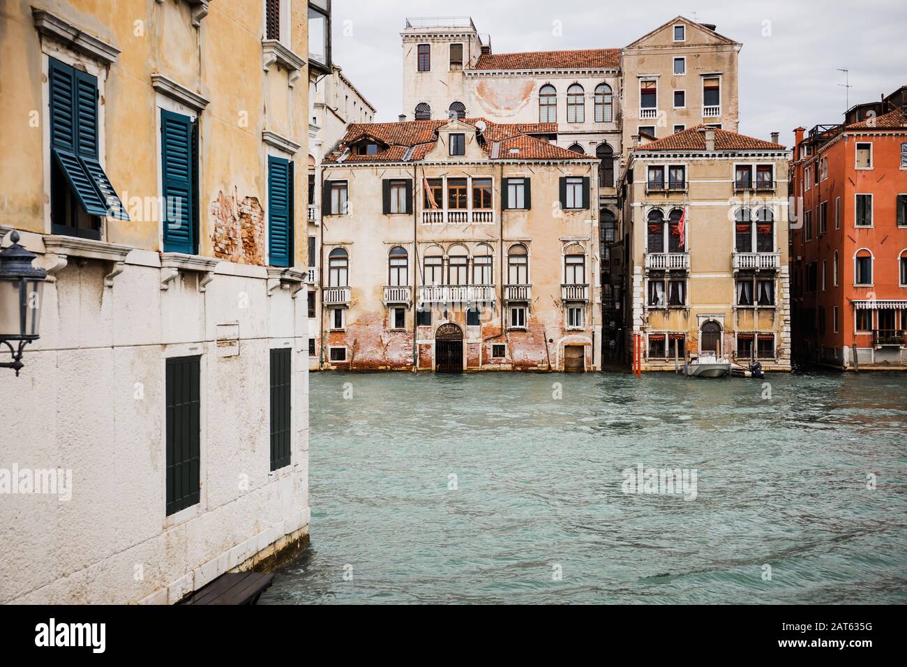 ancient and colorful buildings and canal in Venice, Italy Stock Photo ...