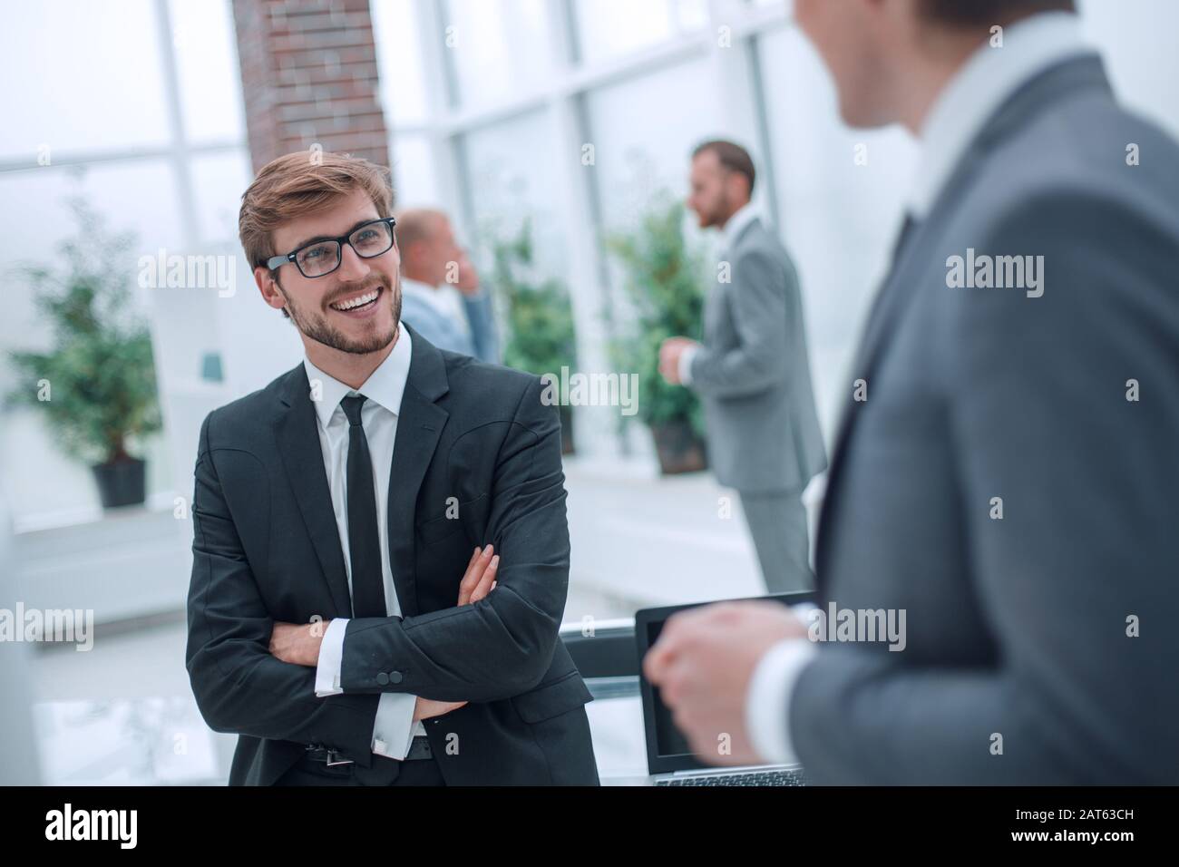 businessman listening attentively to the ideas of his colleague Stock ...