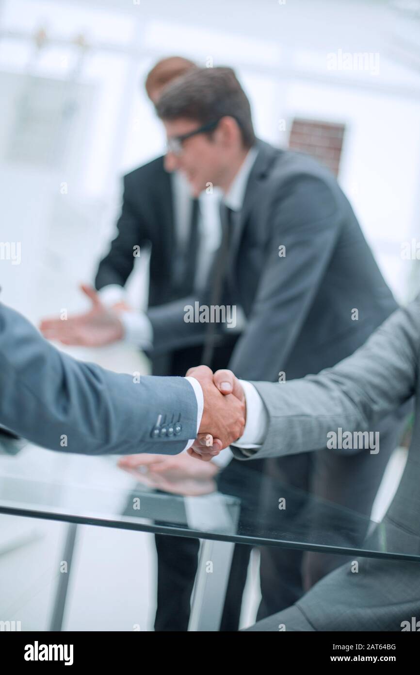 close up. business handshake in a modern office Stock Photo - Alamy