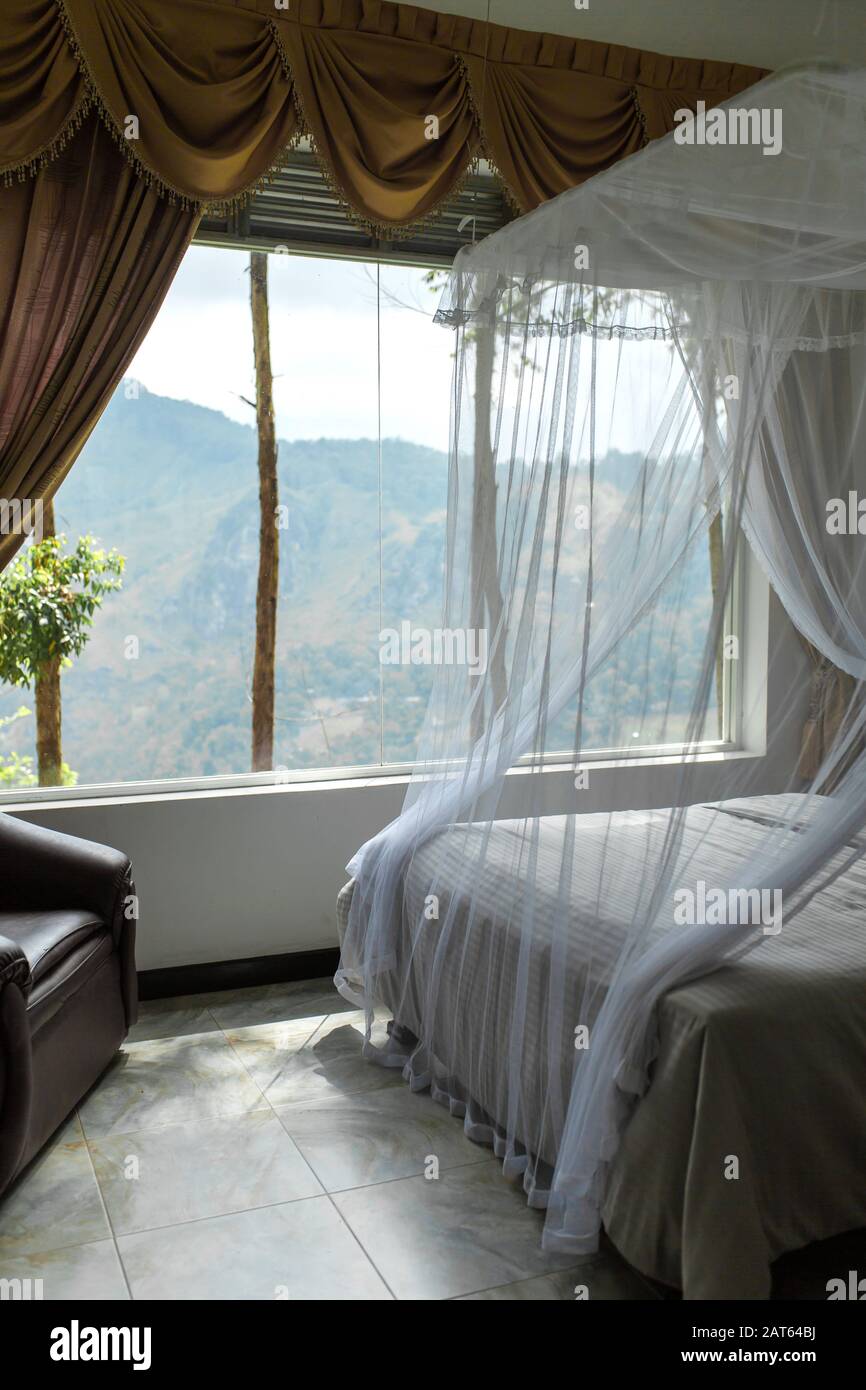 Hotel interior with large panoramic window and view of Mount Stock ...