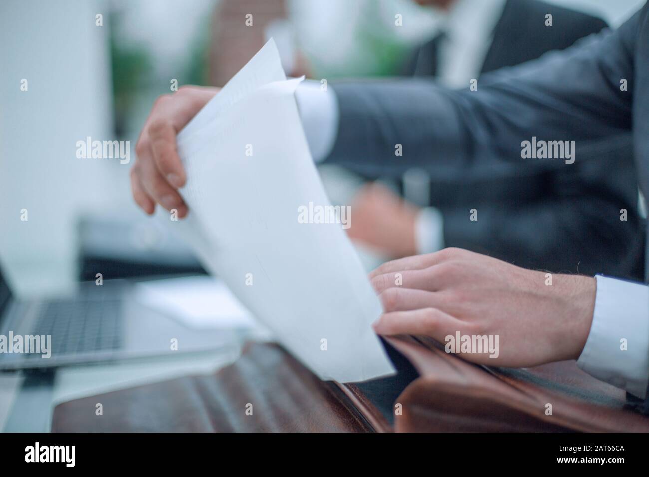 close up. businessman opening briefcase sitting at office Desk Stock ...