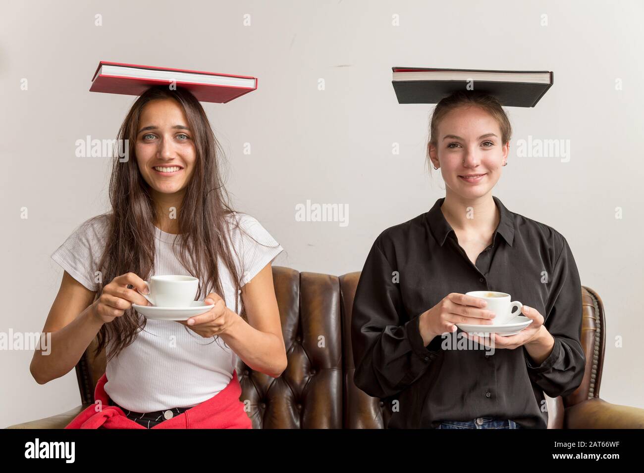 Woman balancing books head hi-res stock photography and images - Alamy