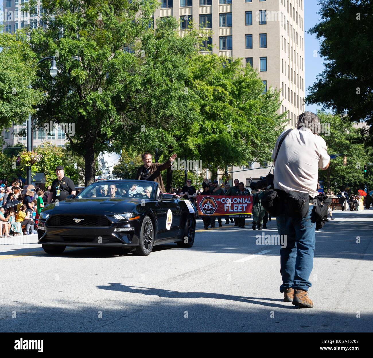 Photographer and Mark Sheppherd in Parade Stock Photo - Alamy