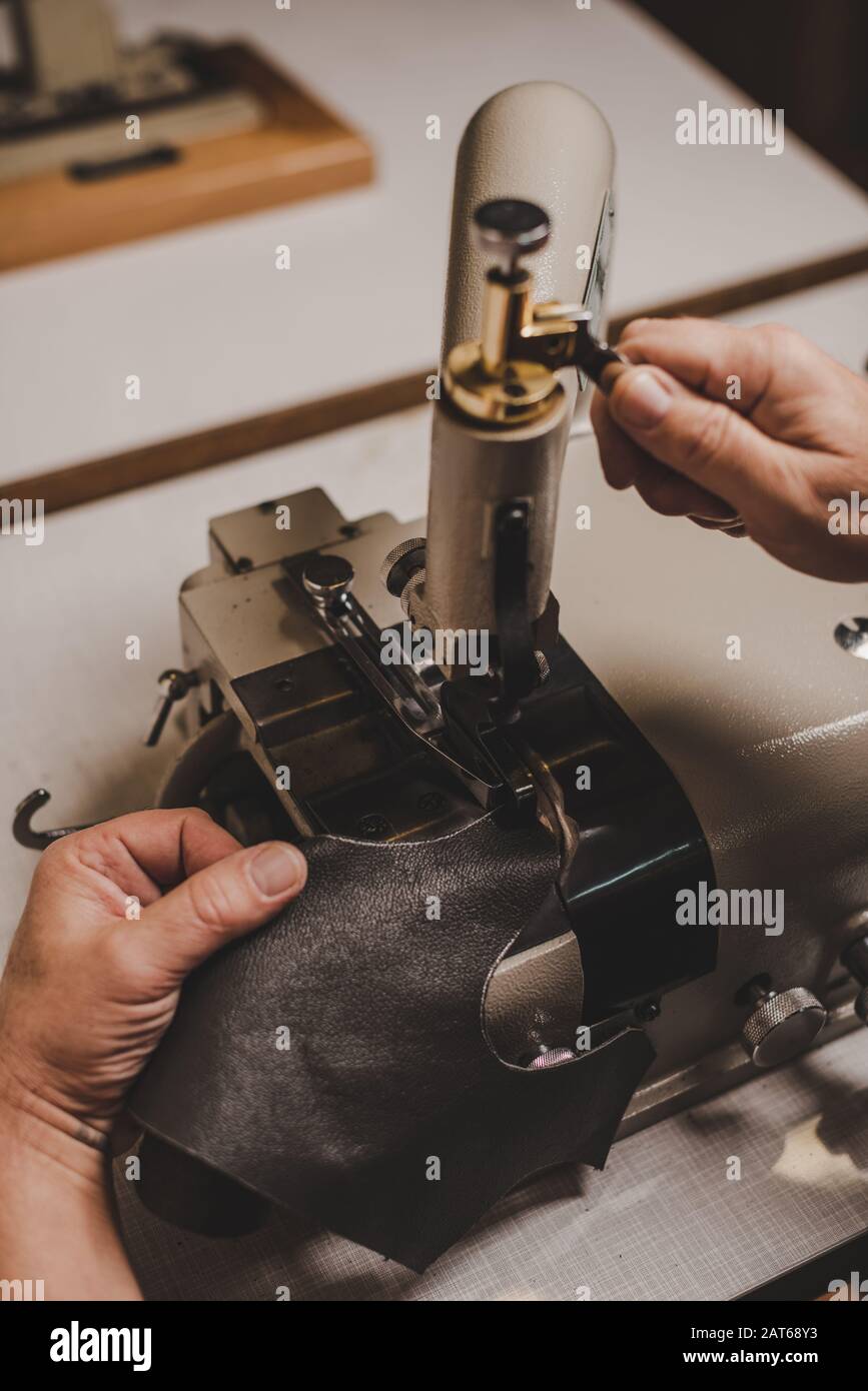 Shoemaker hands sewing machine hi-res stock photography and images - Alamy