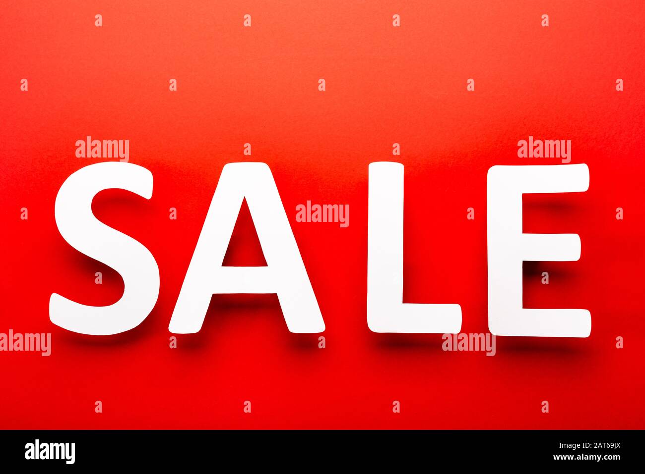 top view of price tag with sale lettering isolated on red Stock Photo ...
