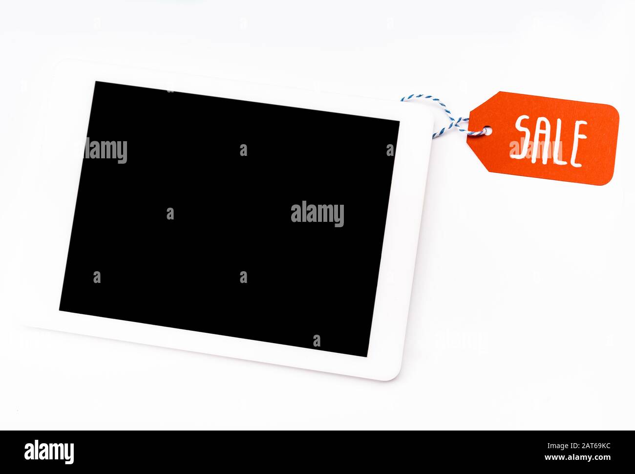 top view of digital tablet with blank screen with red price tag with ...
