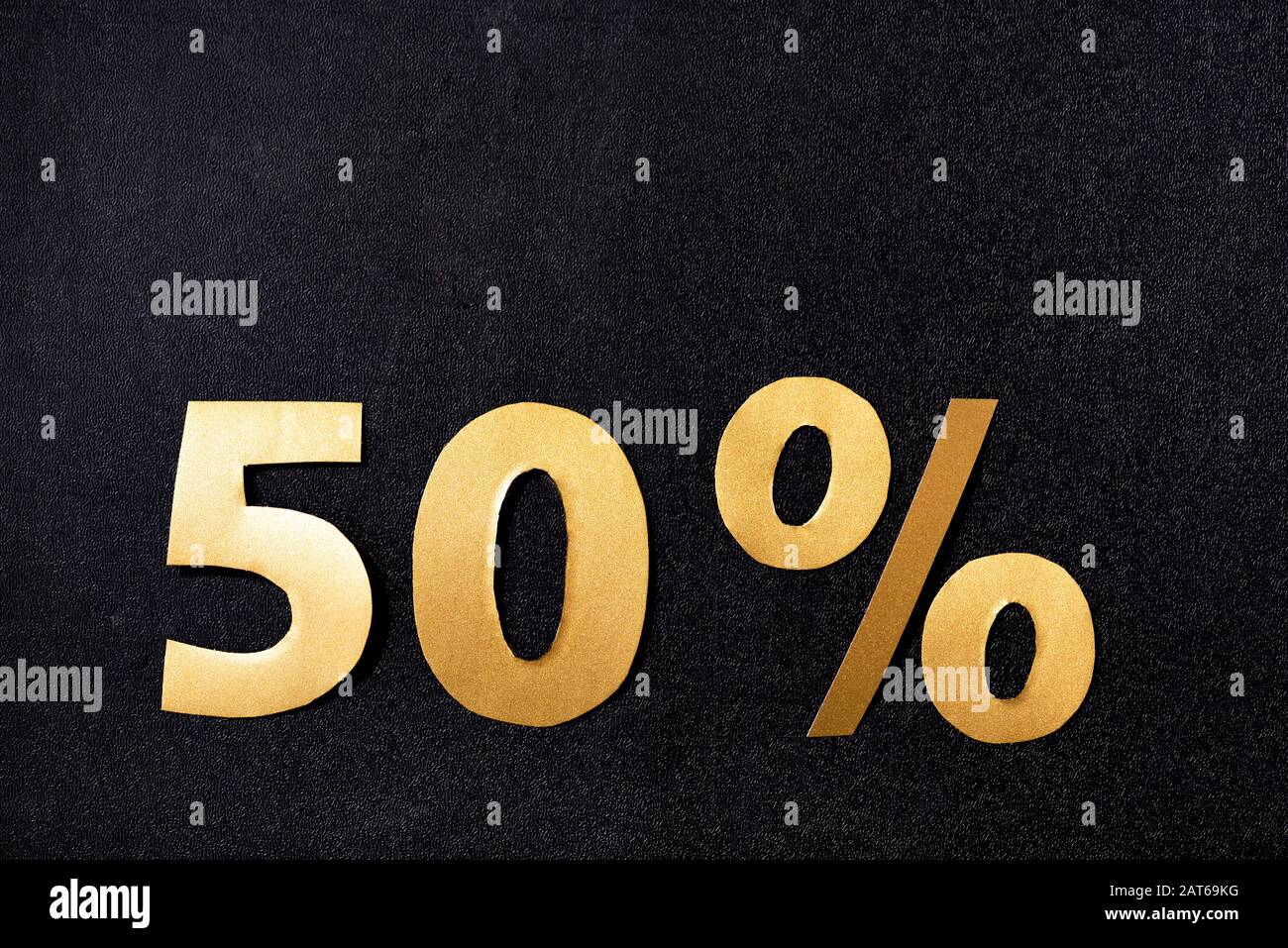 top view of 50 percent signs on black background Stock Photo - Alamy