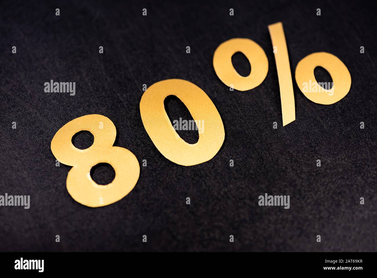 golden 80 percent signs on black background Stock Photo - Alamy