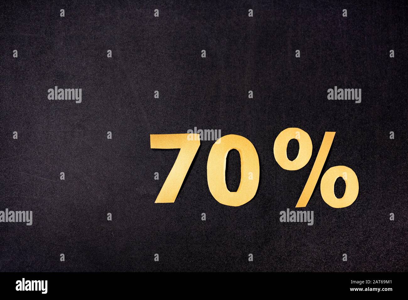 top view of 70 percent signs on black background Stock Photo - Alamy