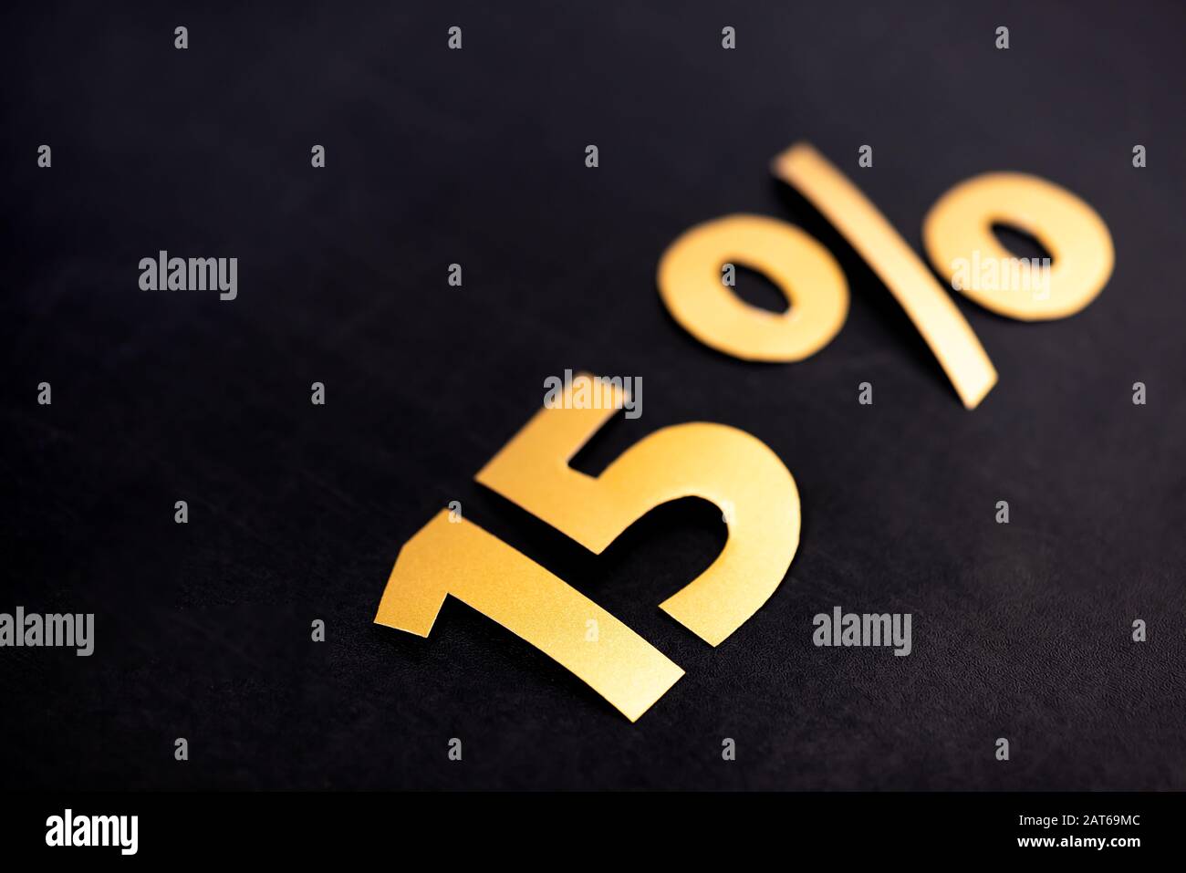 golden 15 percent signs on black background Stock Photo - Alamy