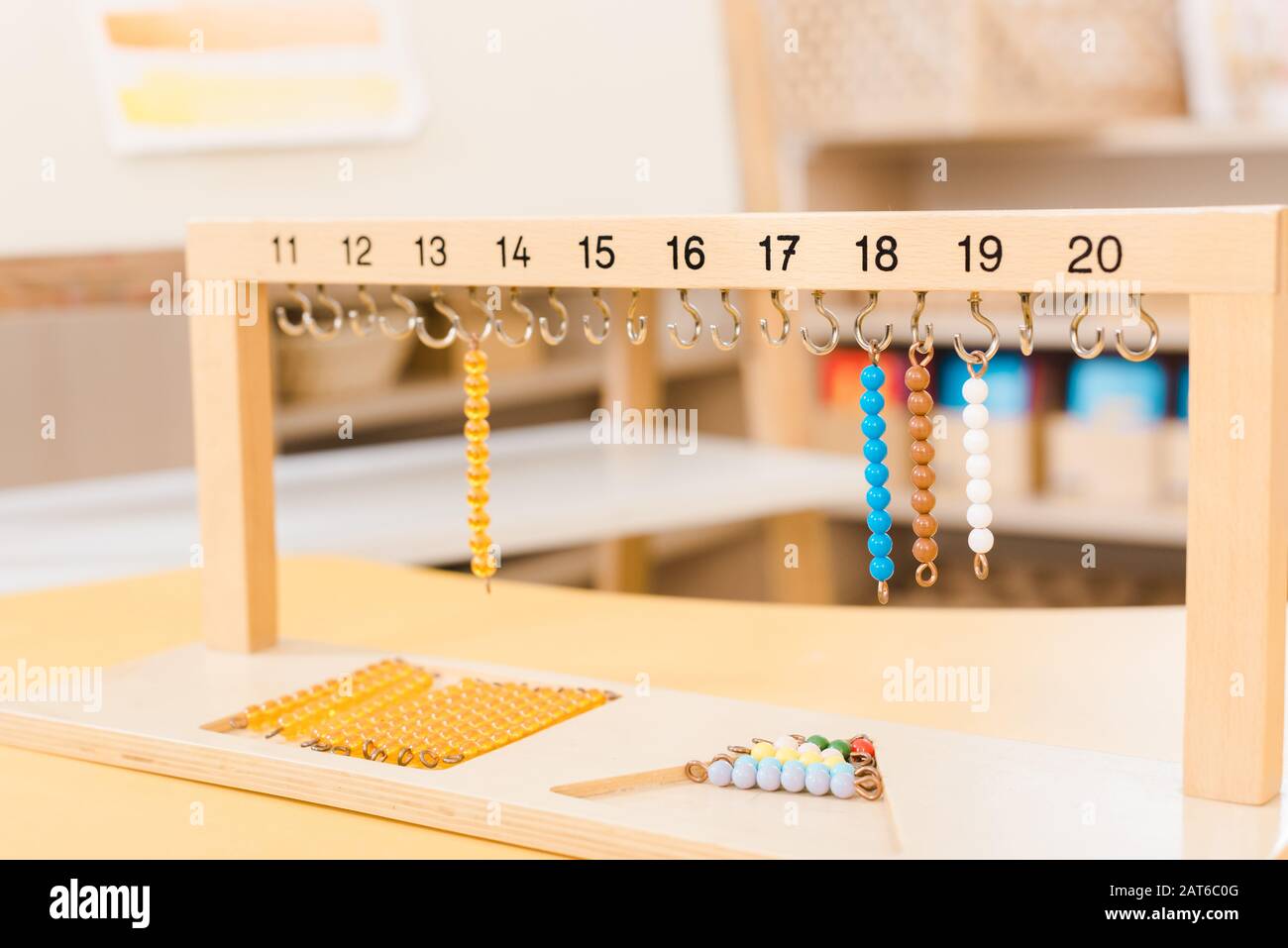 Educational game with beads and numbers on table in class Stock Photo ...
