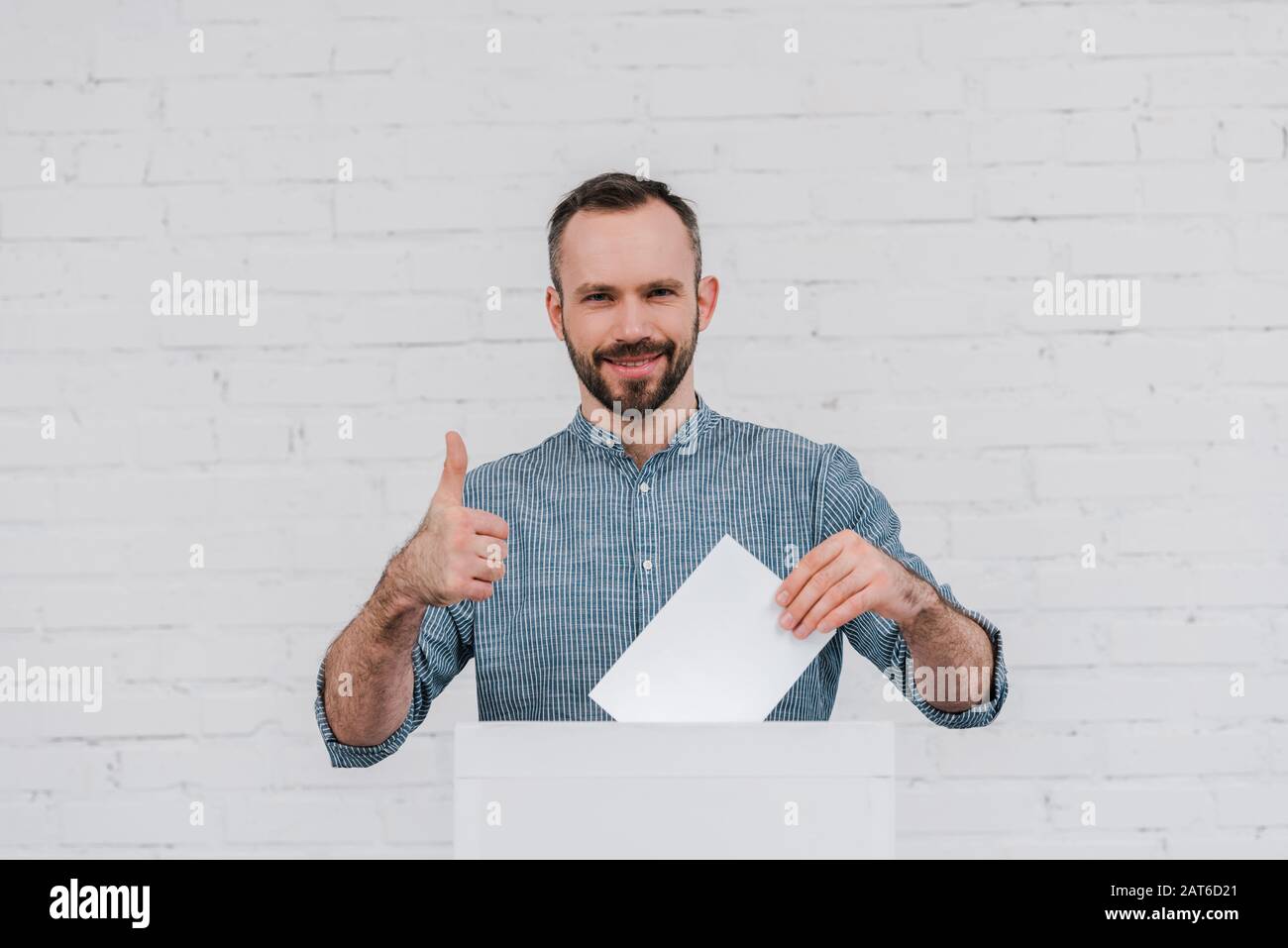 Cheerful voter showing thumb hi-res stock photography and images - Alamy