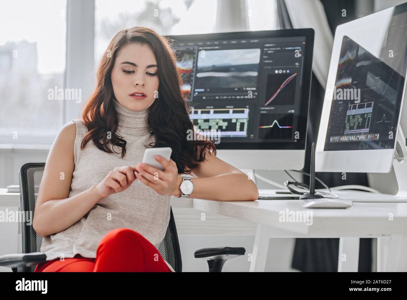 Woman using video editor hi-res stock photography and images - Alamy
