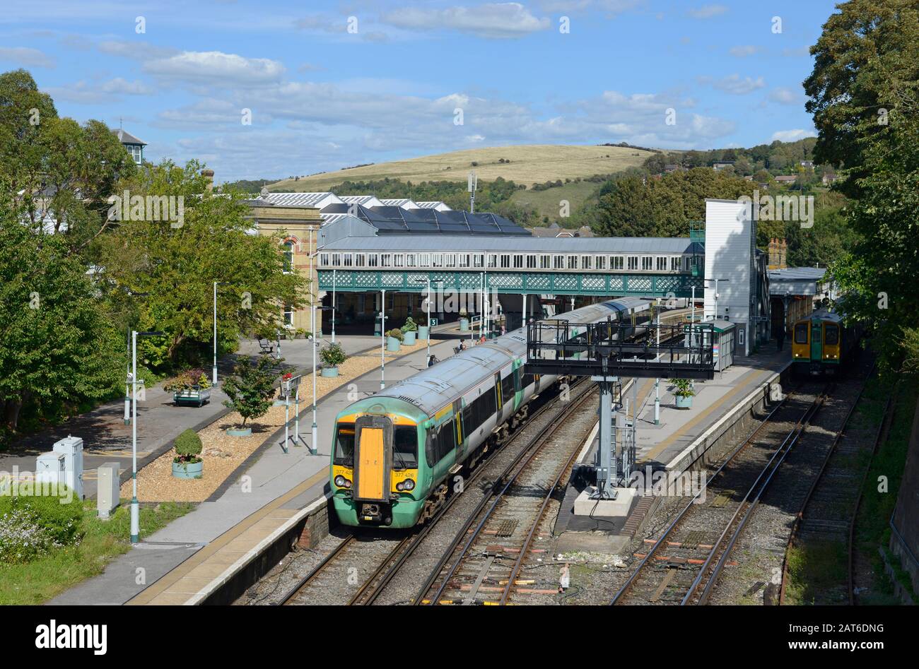 A Southern railway electric train waits in Lewes railway station with a ...