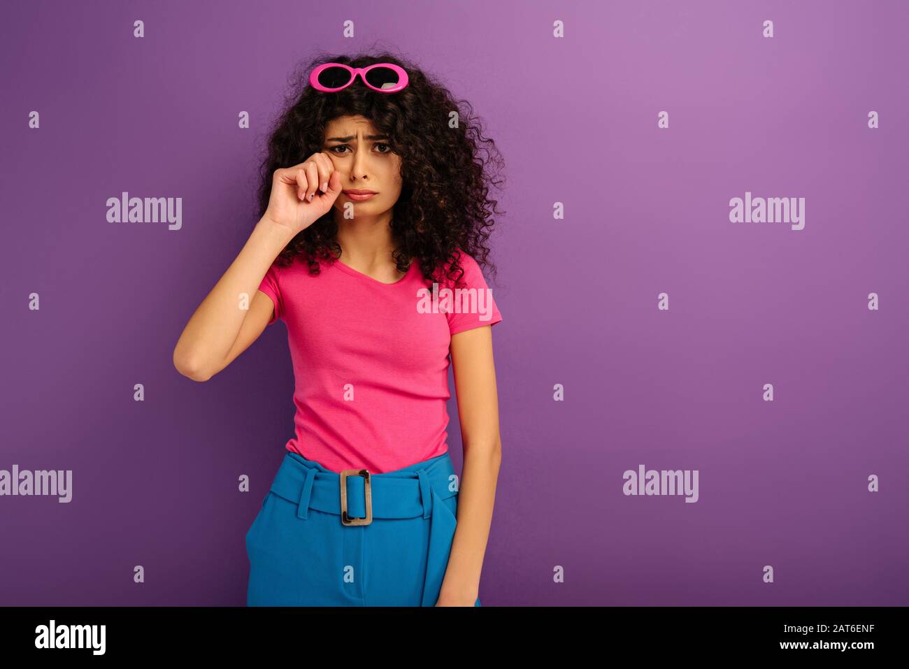 Girl wiping tears hi-res stock photography and images - Alamy