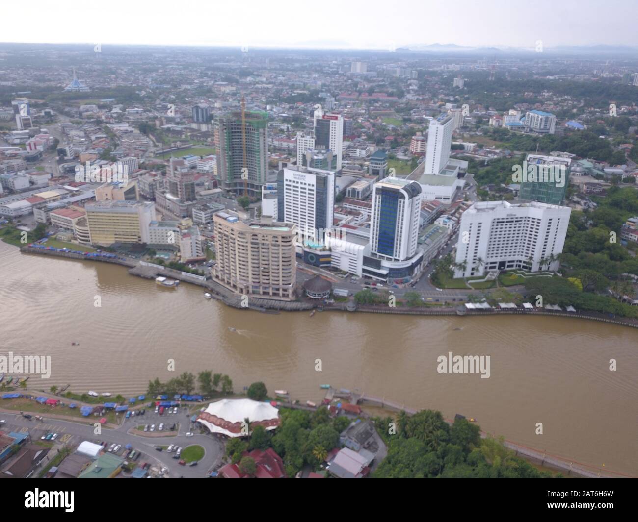 Aerial view of the Kuching city area, with the rivers, bridges, hills ...
