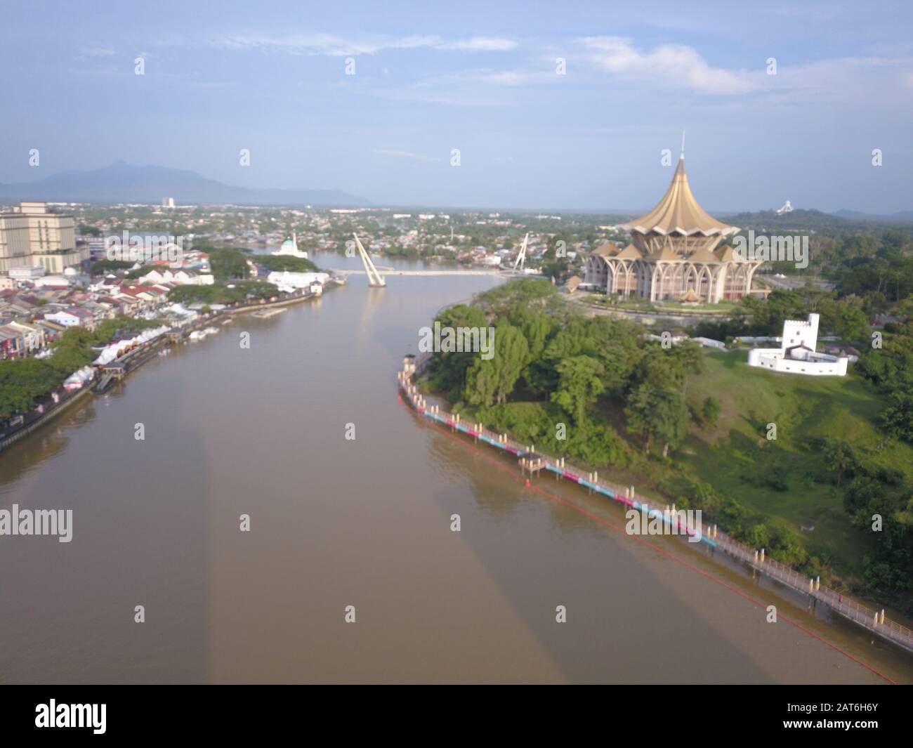 Aerial view of the Kuching city area, with the rivers, bridges, hills ...