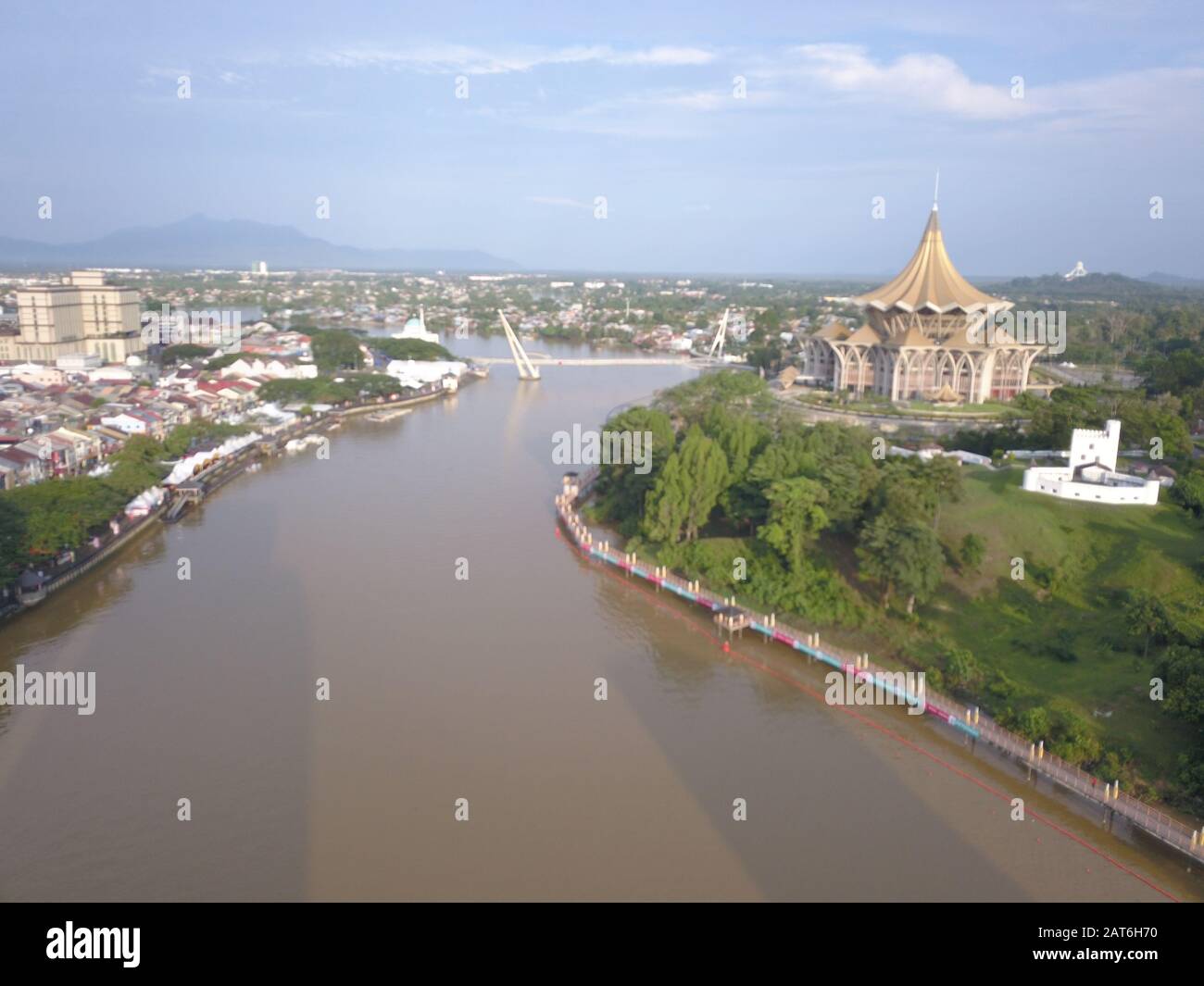 Aerial view of the Kuching city area, with the rivers, bridges, hills ...