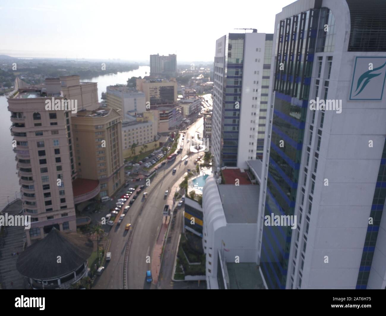 Aerial view of the Kuching city area, with the rivers, bridges, hills ...