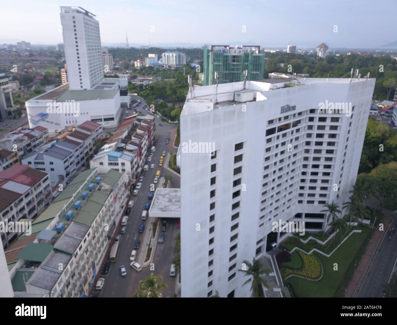 Aerial view of the Kuching city area, with the rivers, bridges, hills ...