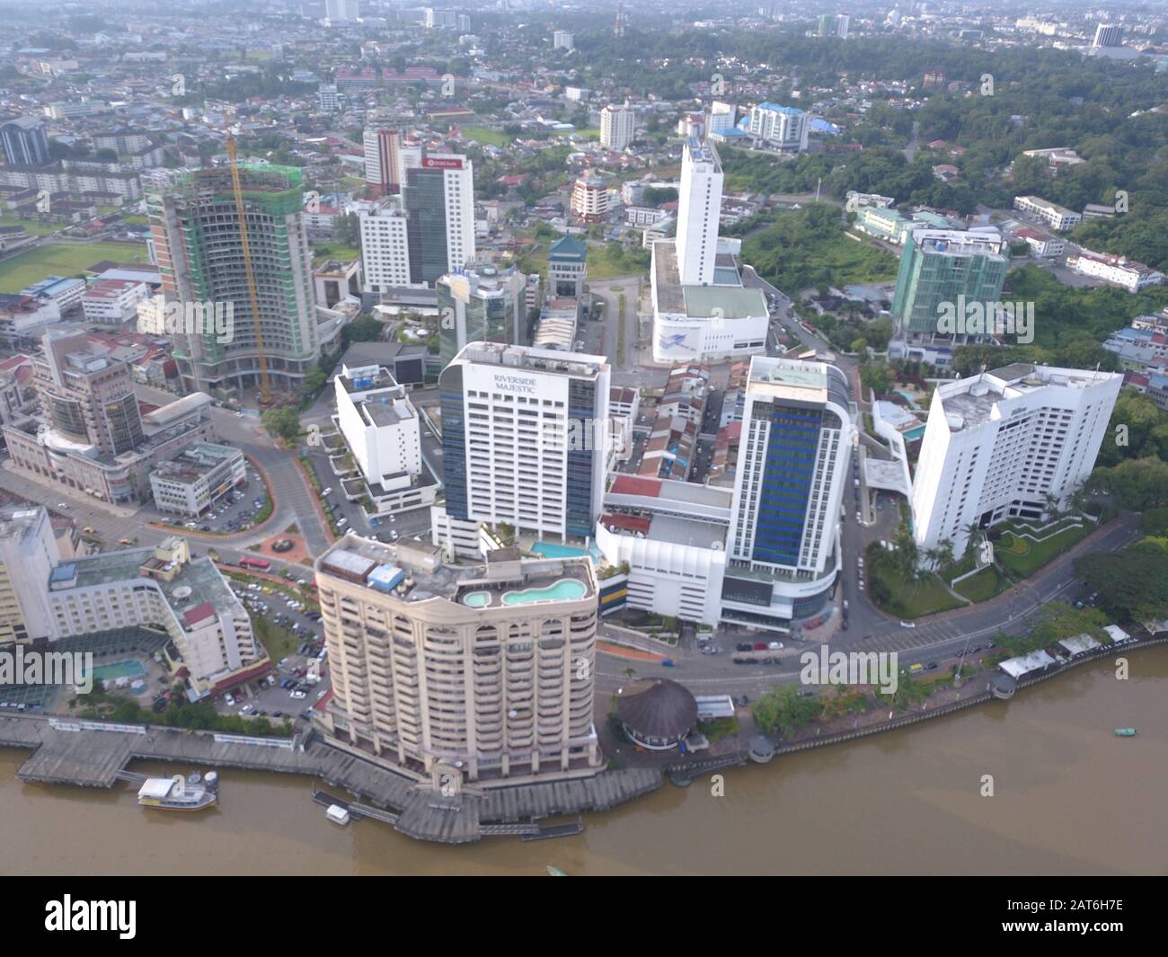 Aerial view of the Kuching city area, with the rivers, bridges, hills ...