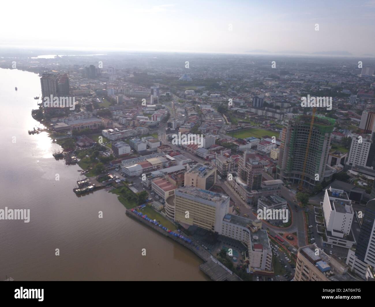 Aerial view of the Kuching city area, with the rivers, bridges, hills ...