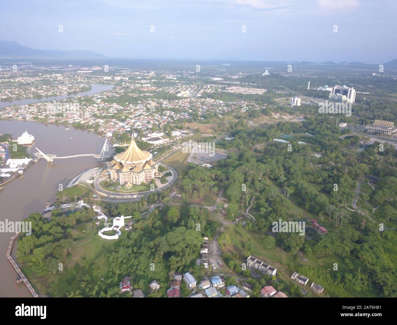 Aerial view of the Kuching city area, with the rivers, bridges, hills ...