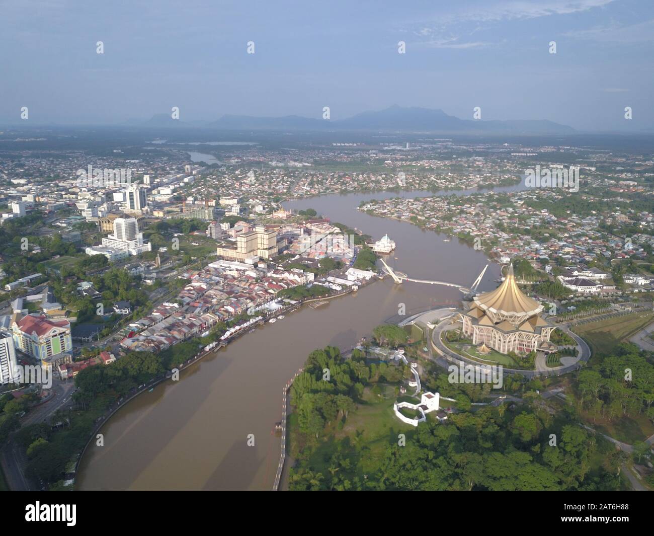 Aerial view of the Kuching city area, with the rivers, bridges, hills ...