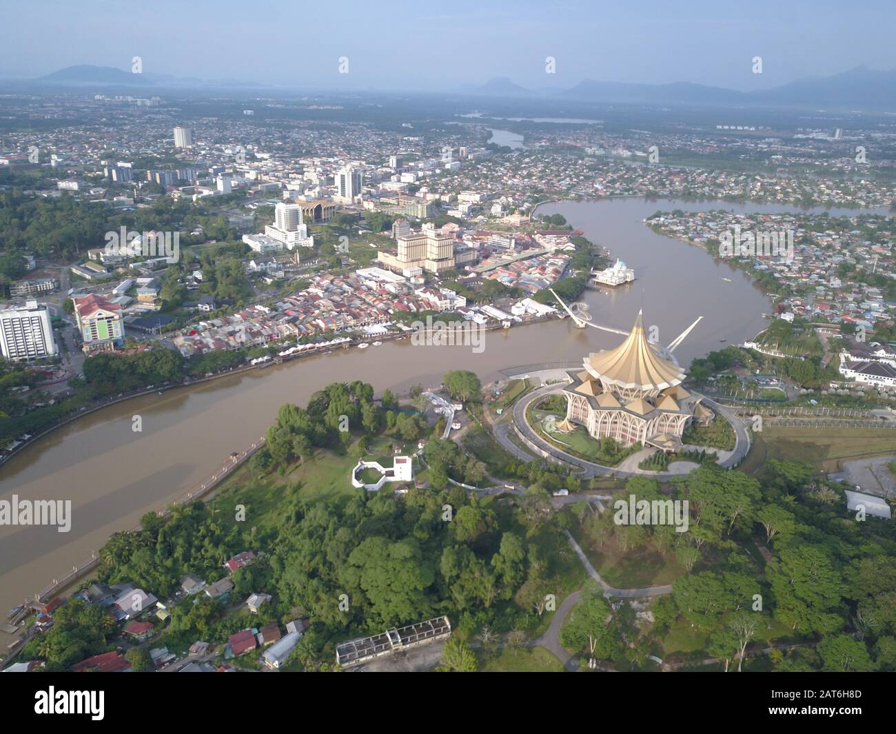 Aerial view of the Kuching city area, with the rivers, bridges, hills ...