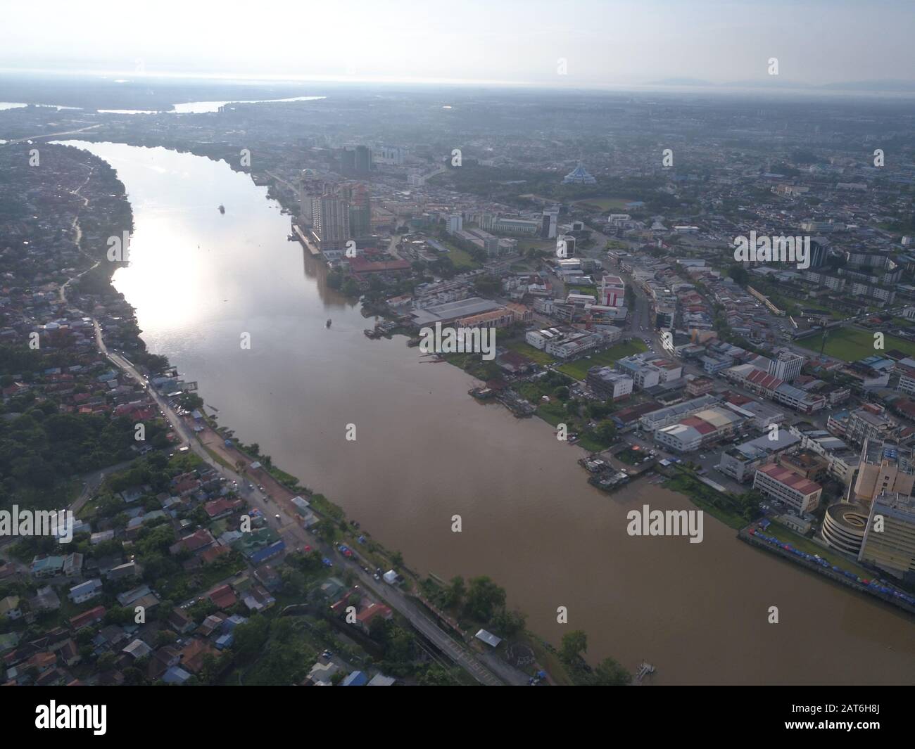 Aerial view of the Kuching city area, with the rivers, bridges, hills ...