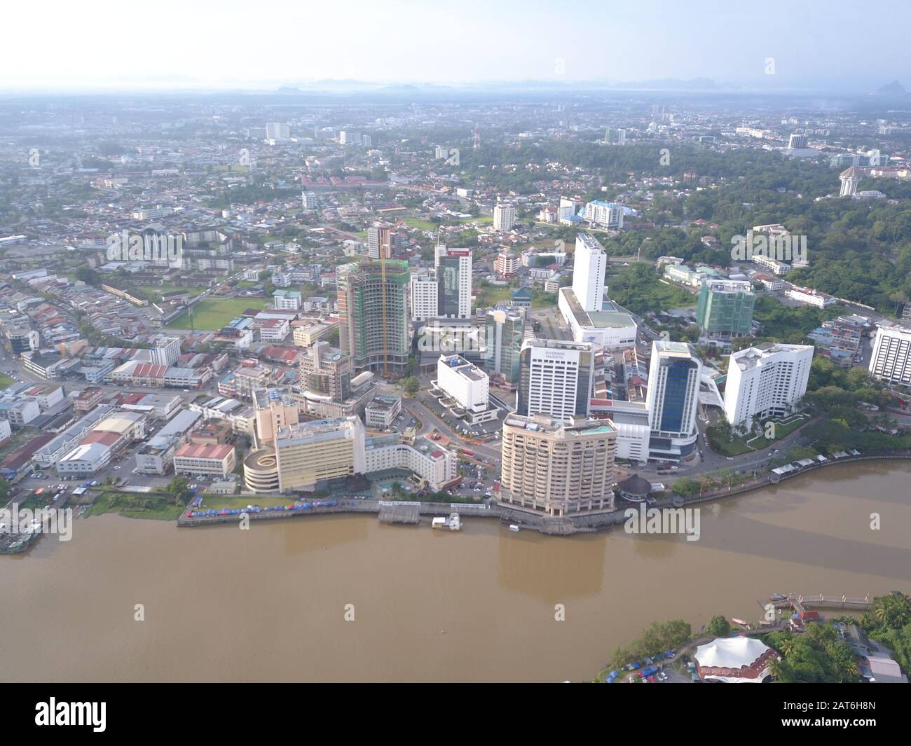 Aerial view of the Kuching city area, with the rivers, bridges, hills ...