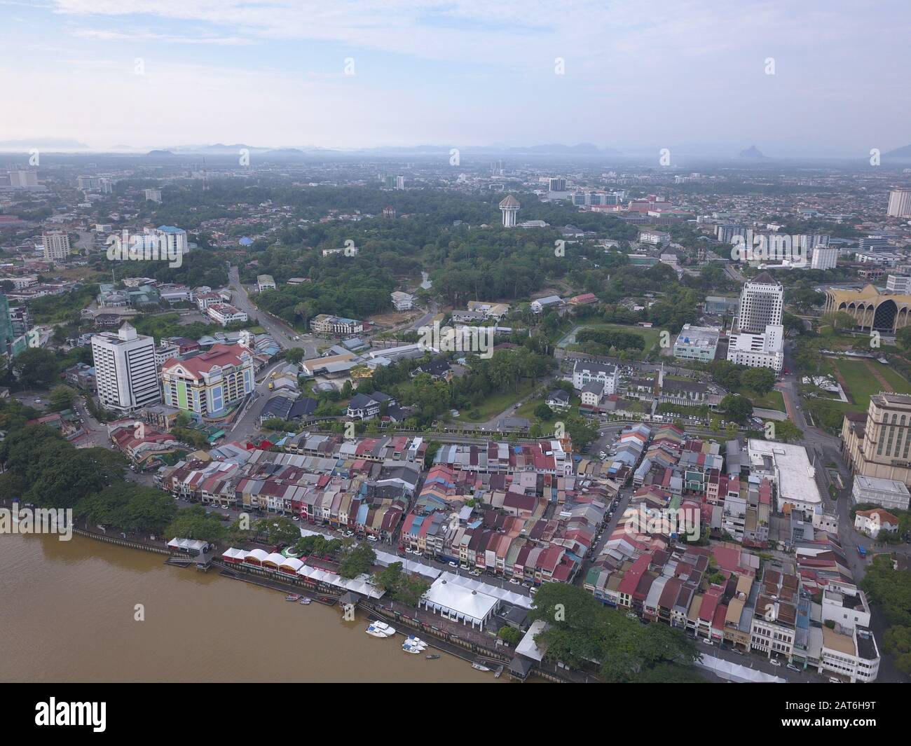 Aerial view of the Kuching city area, with the rivers, bridges, hills ...