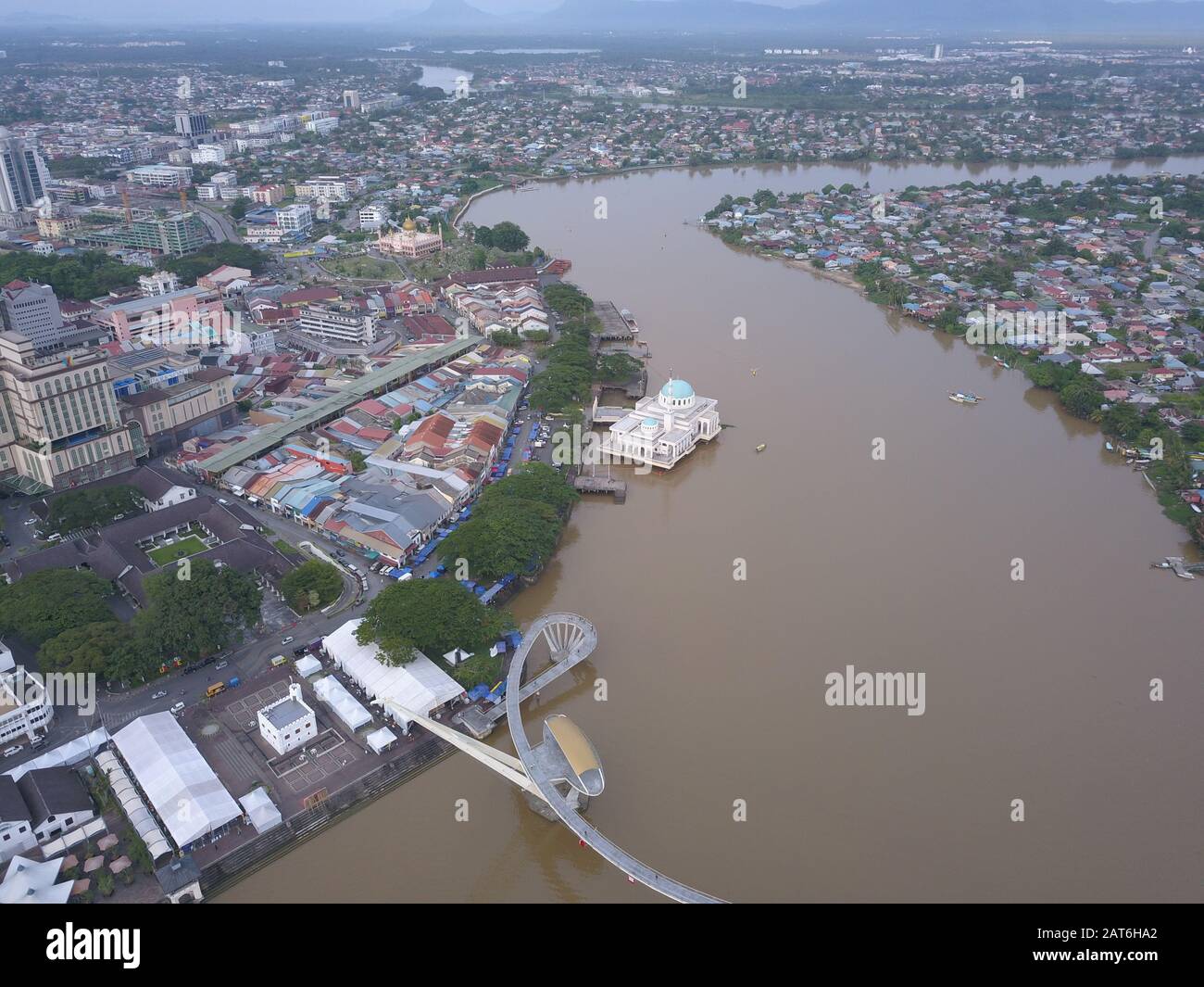 Aerial view of the Kuching city area, with the rivers, bridges, hills ...