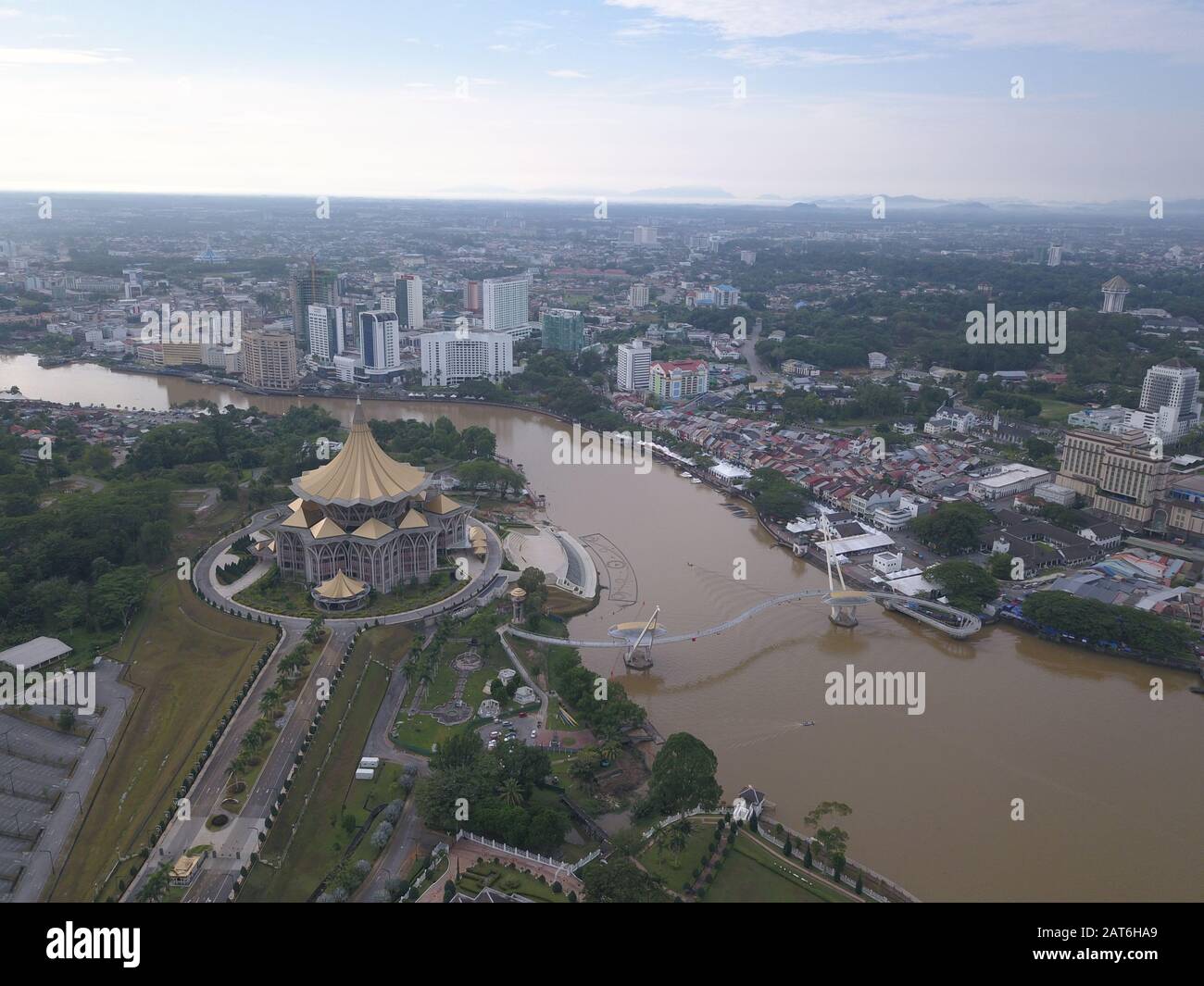 Aerial view of the Kuching city area, with the rivers, bridges, hills ...