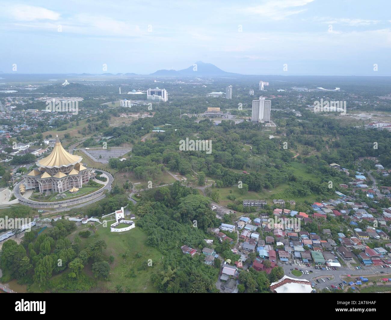 Aerial view of the Kuching city area, with the rivers, bridges, hills ...