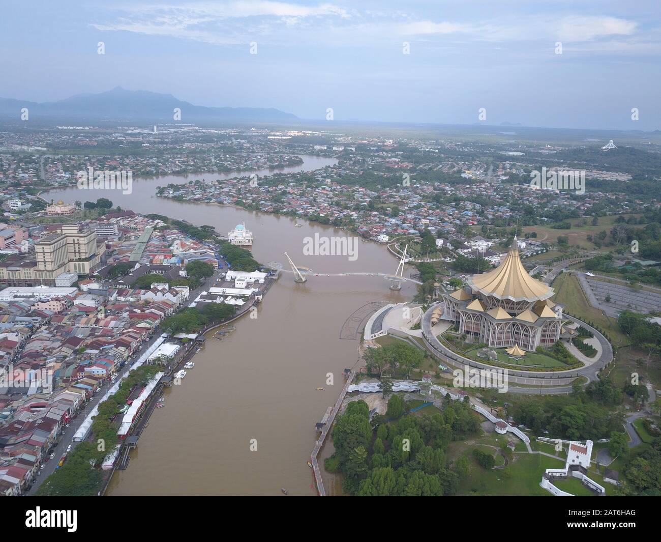 Aerial view of the Kuching city area, with the rivers, bridges, hills ...