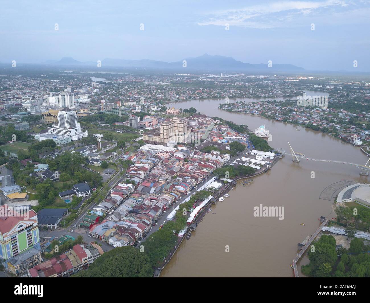 Aerial view of the Kuching city area, with the rivers, bridges, hills ...