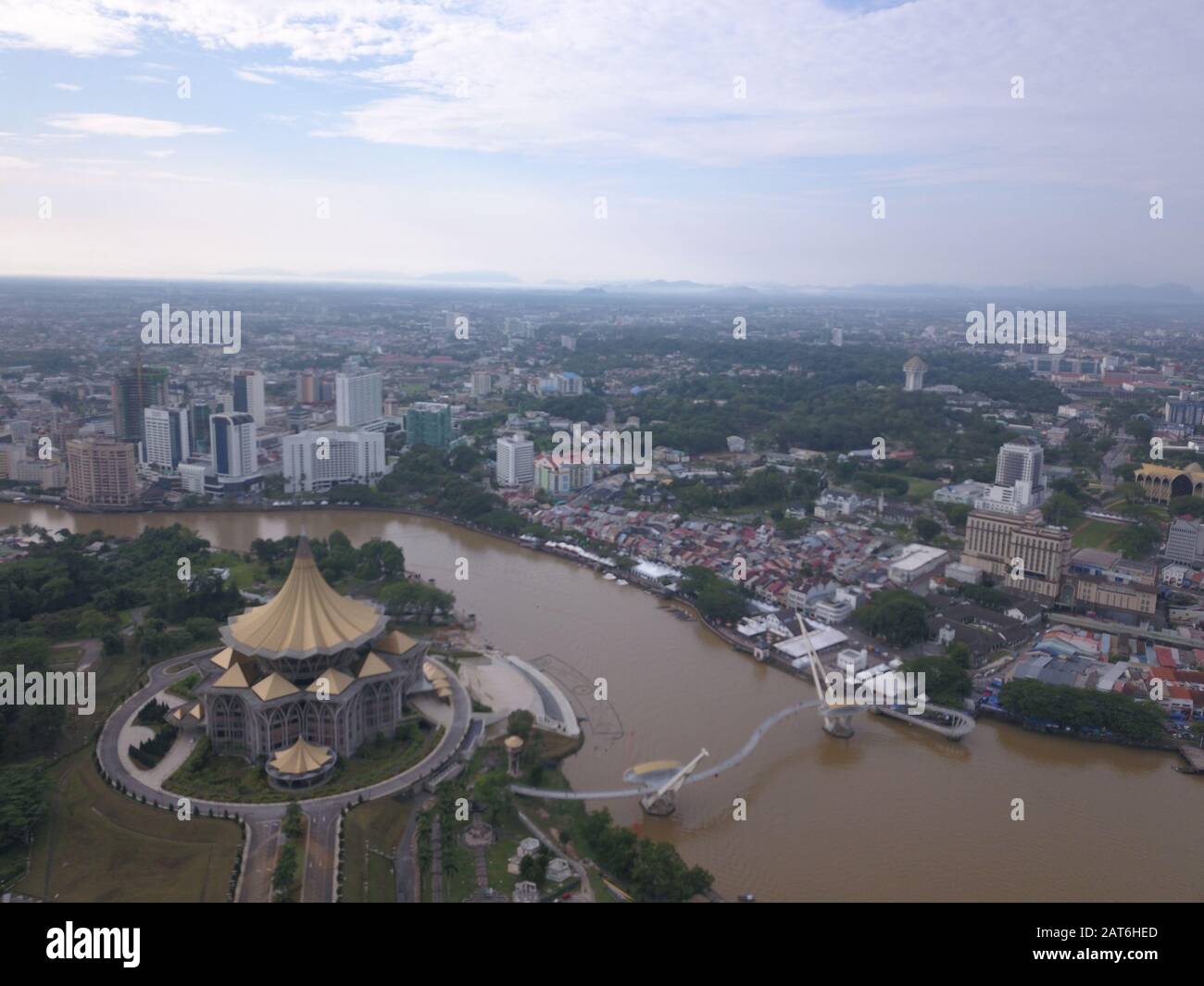Aerial view of the Kuching city area, with the rivers, bridges, hills ...