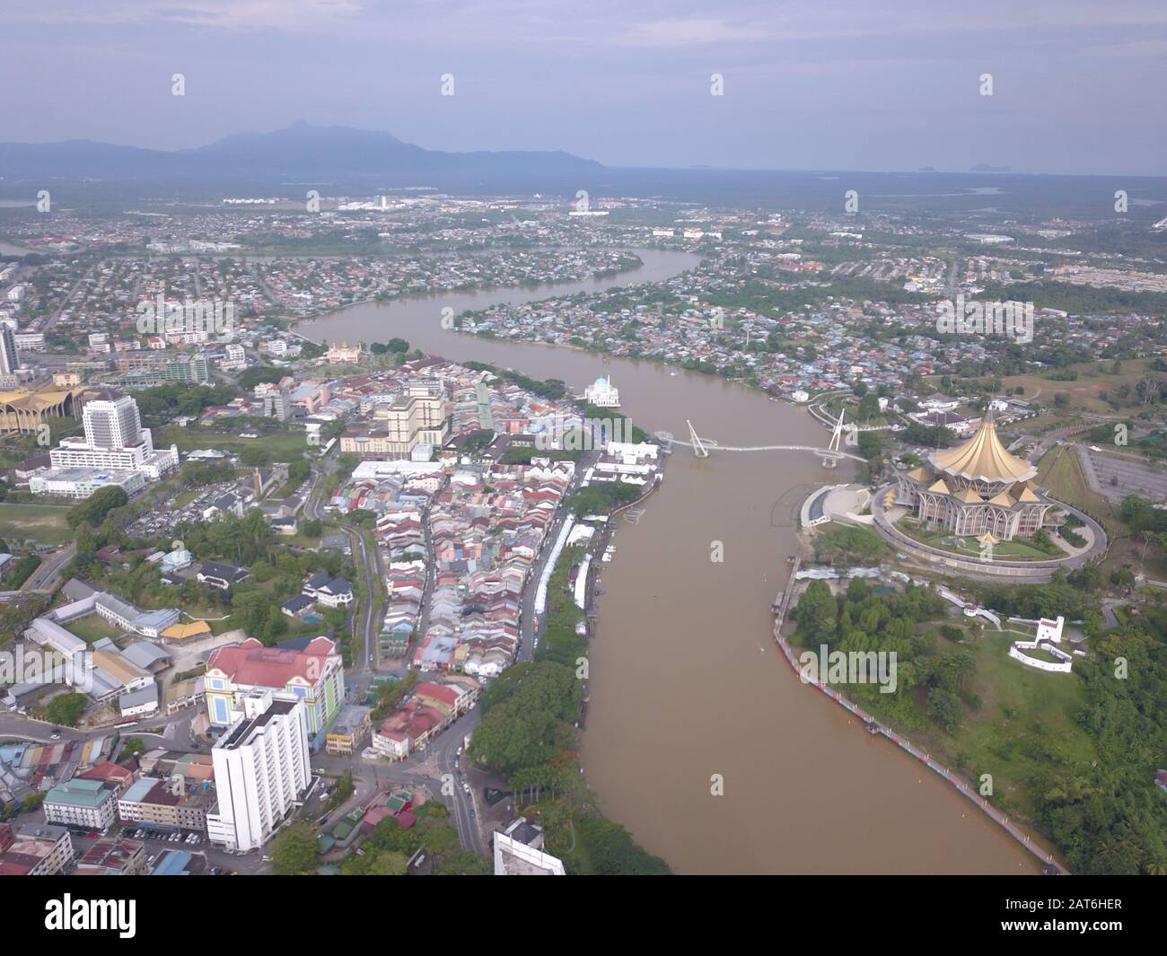 Aerial view of the Kuching city area, with the rivers, bridges, hills ...