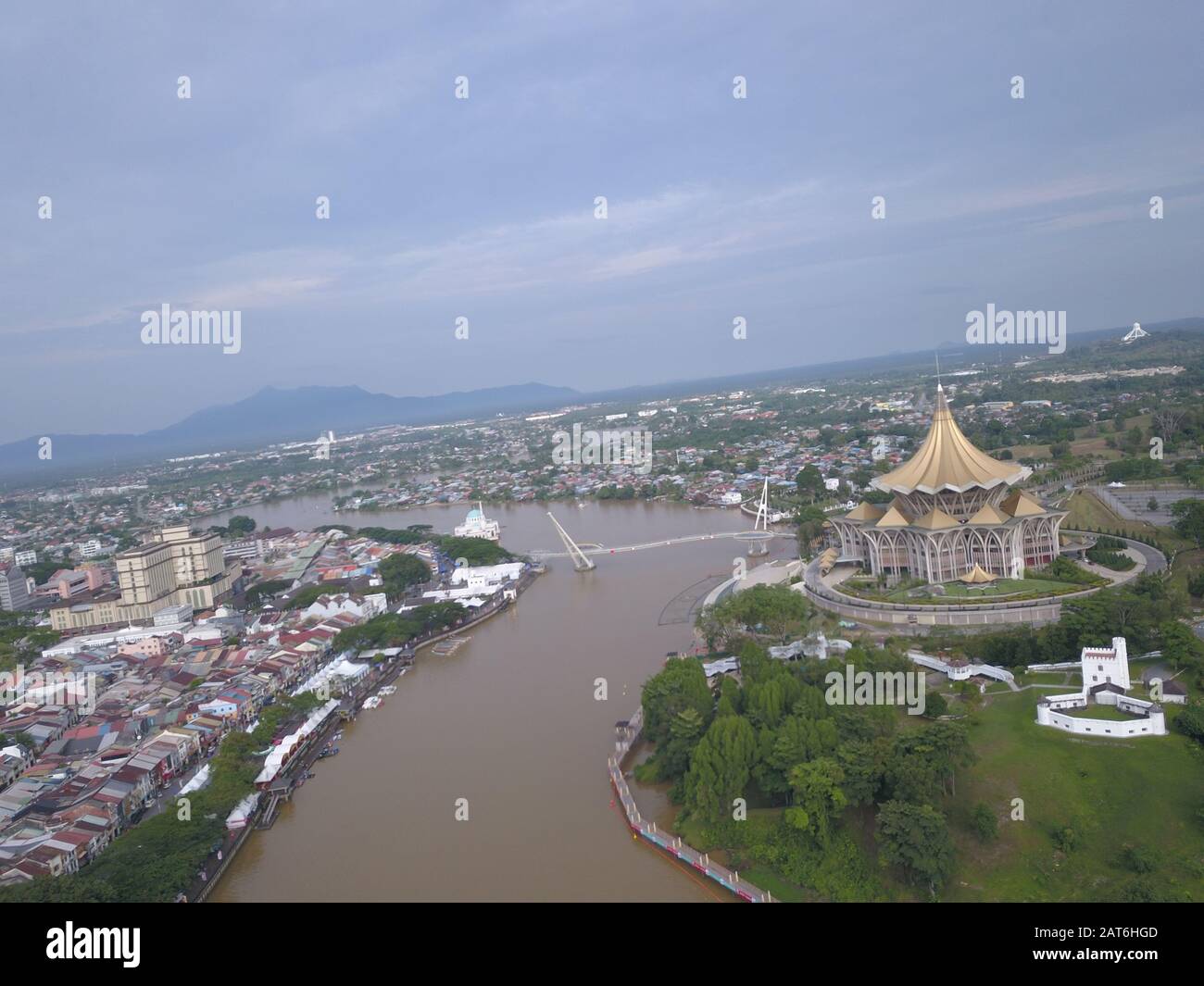 Aerial view of the Kuching city area, with the rivers, bridges, hills ...