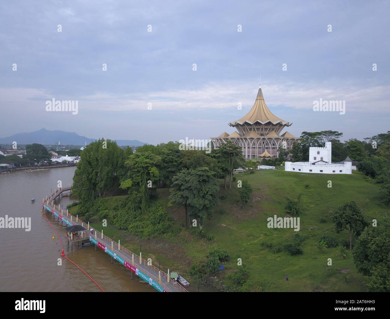 Aerial view of the Kuching city area, with the rivers, bridges, hills ...