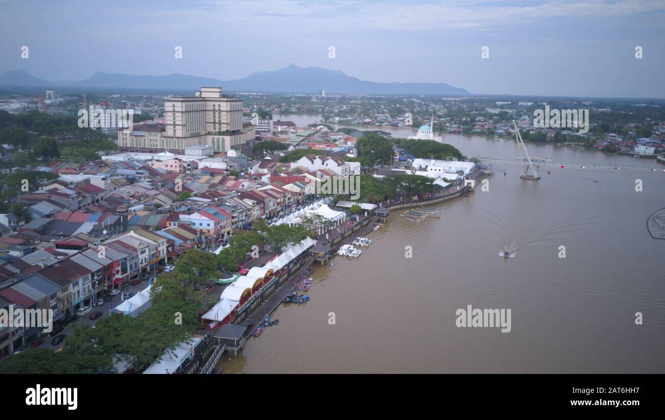 Aerial view of the Kuching city area, with the rivers, bridges, hills ...