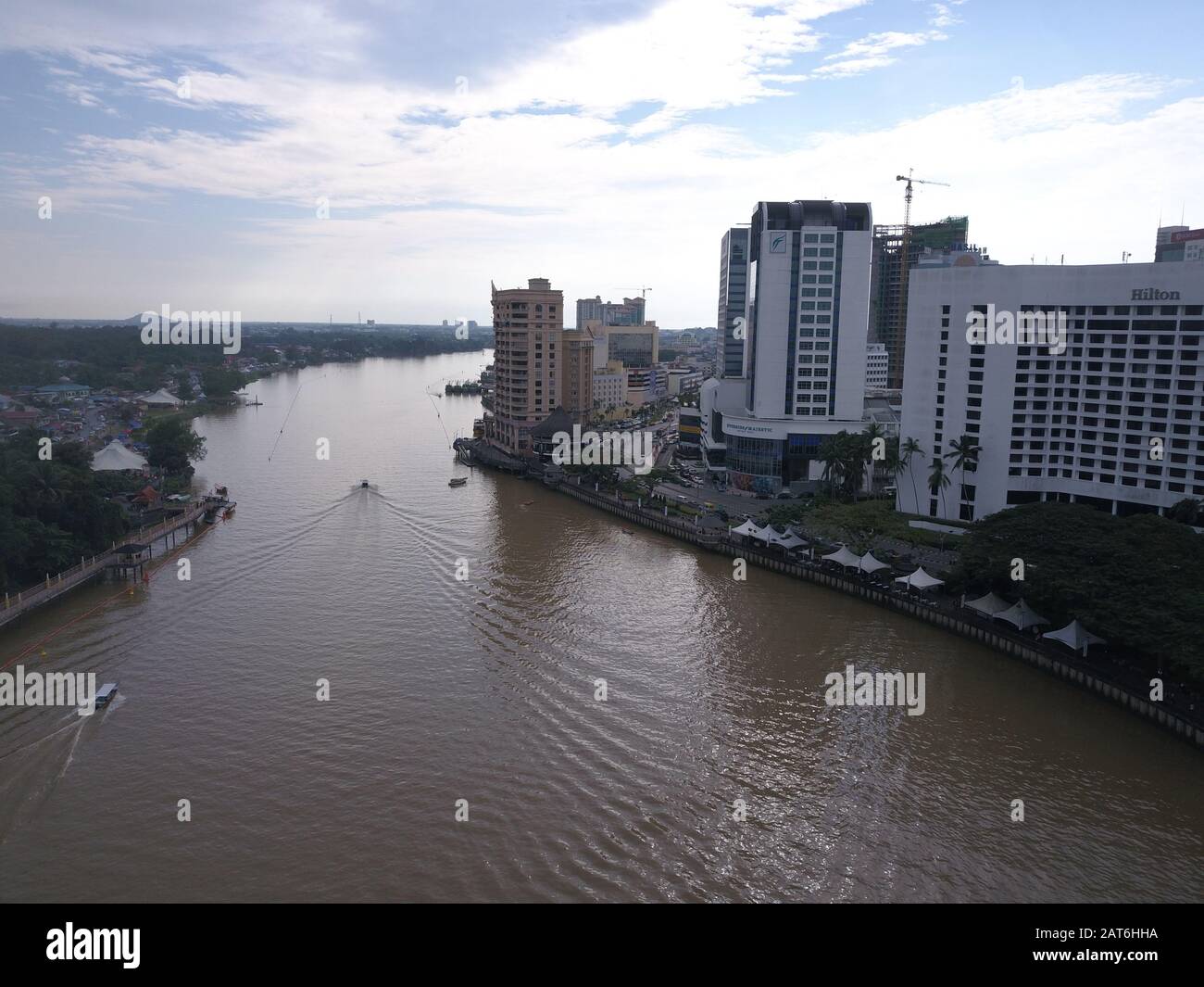 Aerial view of the Kuching city area, with the rivers, bridges, hills ...
