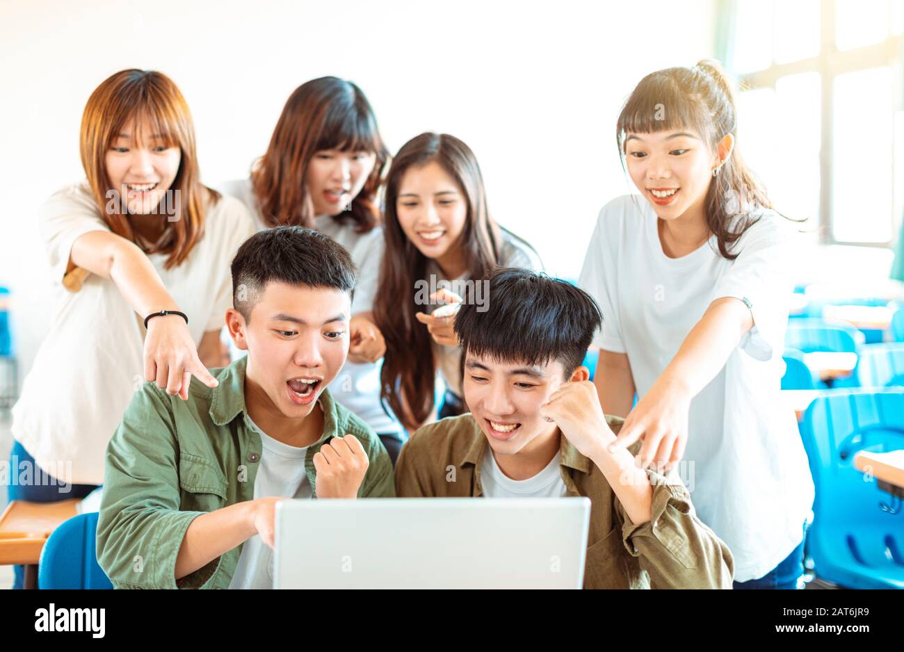 Laughing together classroom hi-res stock photography and images - Alamy