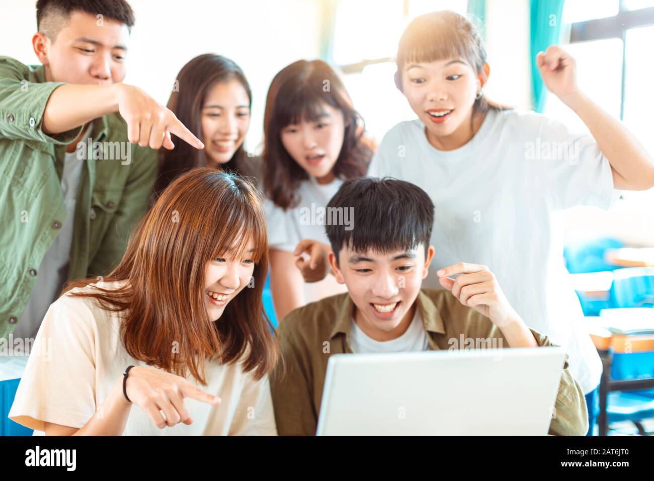 Classmate showing hi-res stock photography and images - Alamy