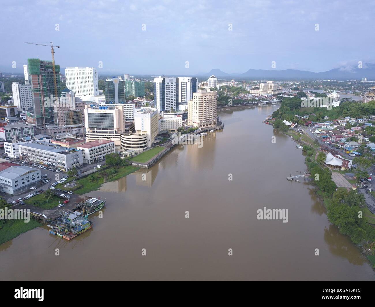 Aerial view of the Kuching city area, with the rivers, bridges, hills ...