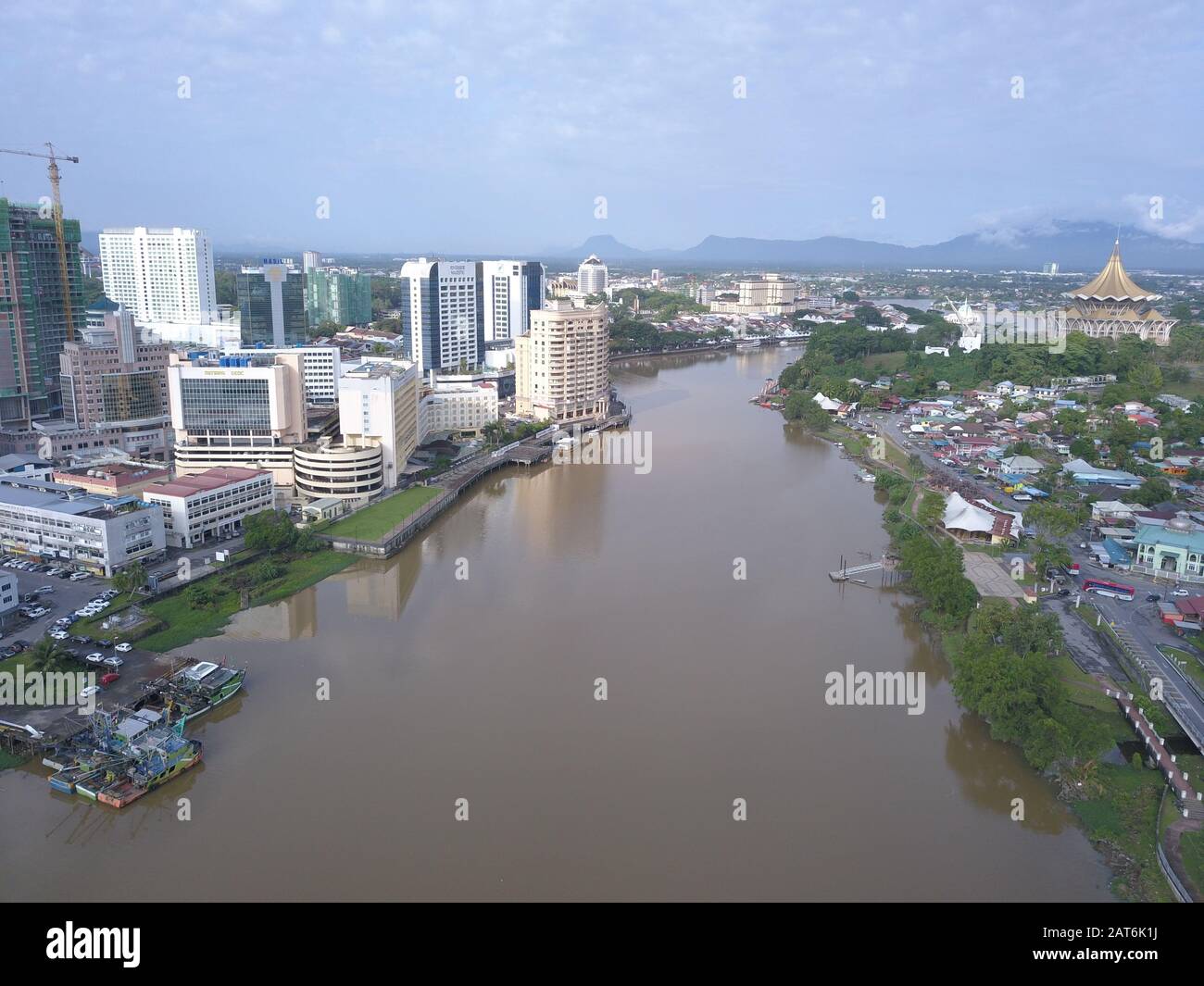 Aerial view of the Kuching city area, with the rivers, bridges, hills ...