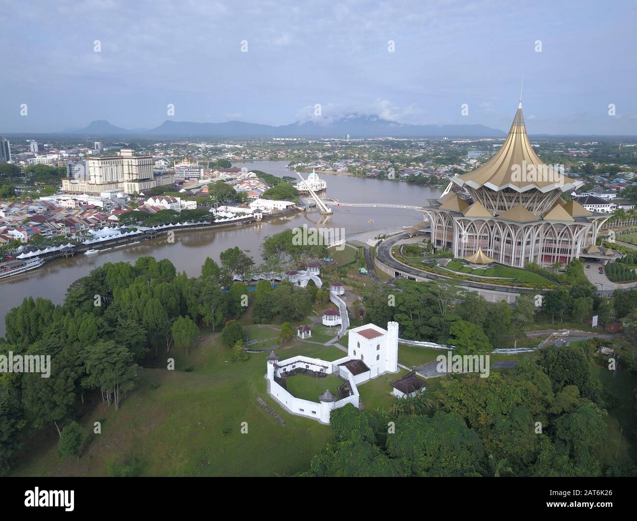 Aerial view of the Kuching city area, with the rivers, bridges, hills ...